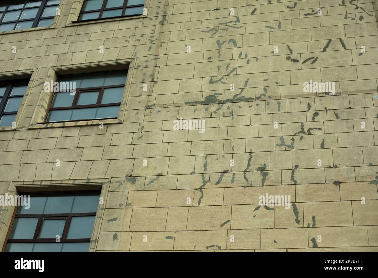 Building with windows in city. High house. Many floors in building ...