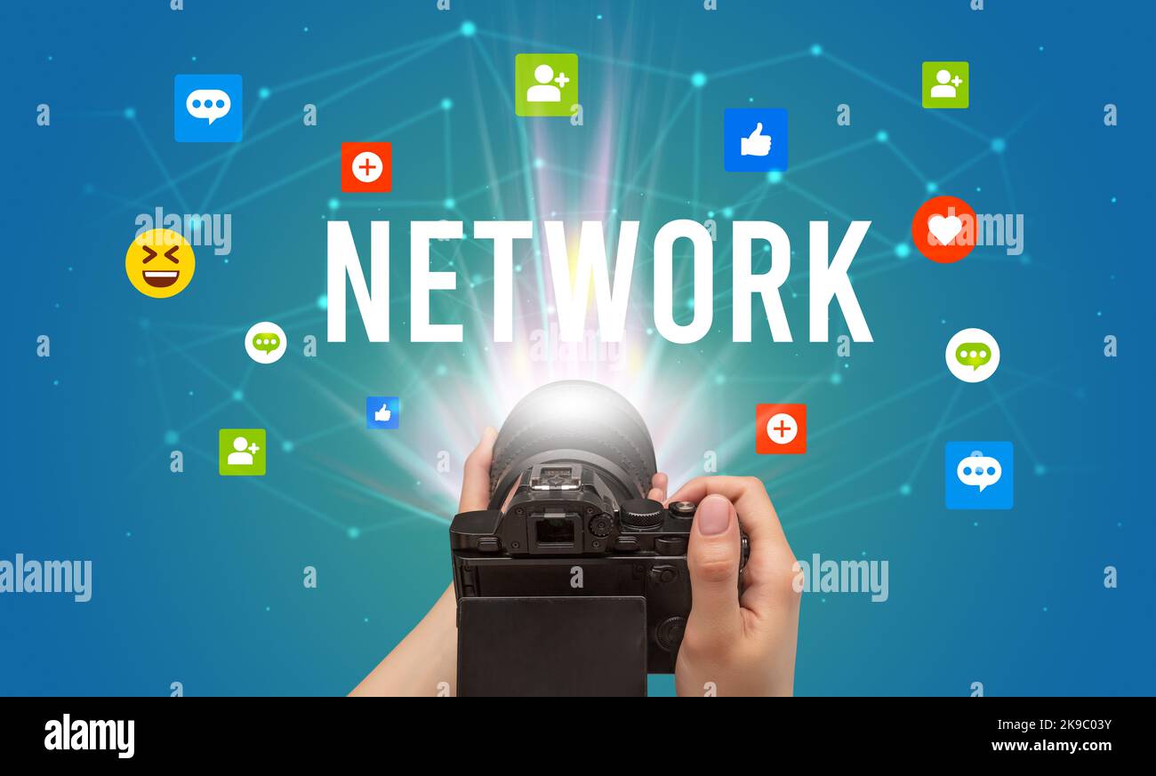 Using camera to capture social media content Stock Photo - Alamy