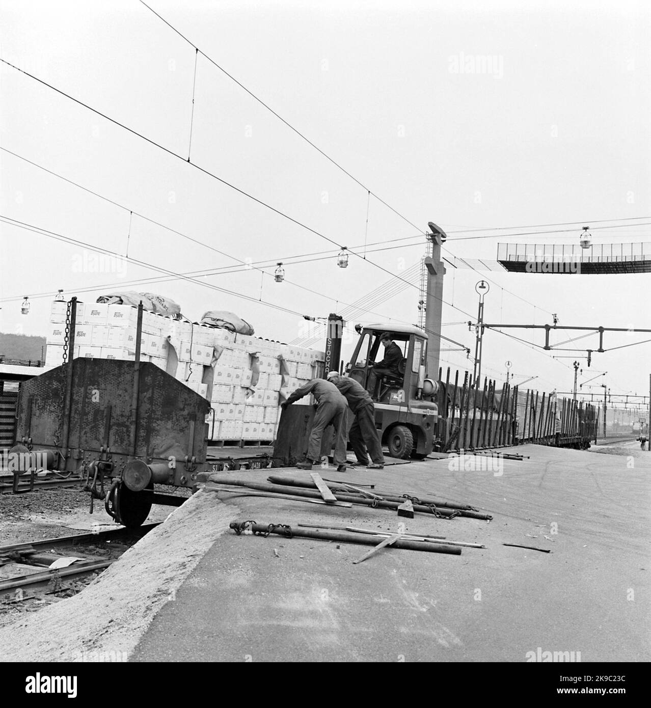 Loading of railway wagon Stock Photo - Alamy