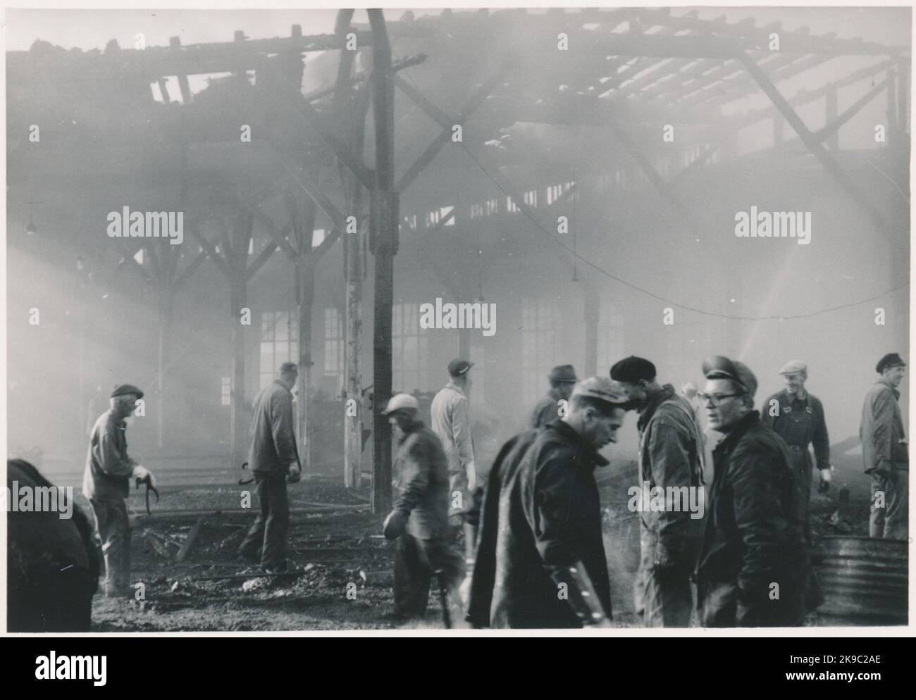 Here's a fire extinguishing work Stock Photo - Alamy