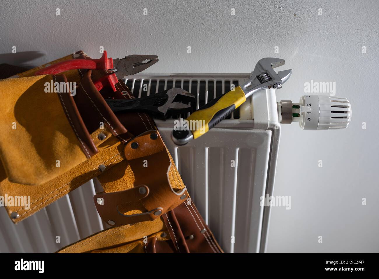 tools on the radiator close up Stock Photo - Alamy