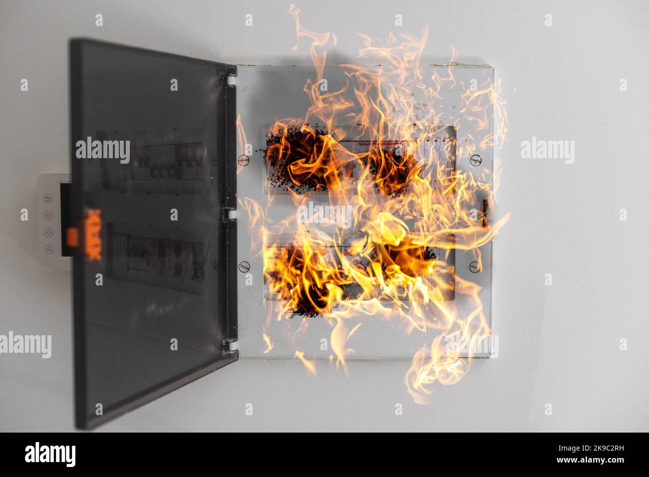 the electrical panel is on fire Stock Photo - Alamy