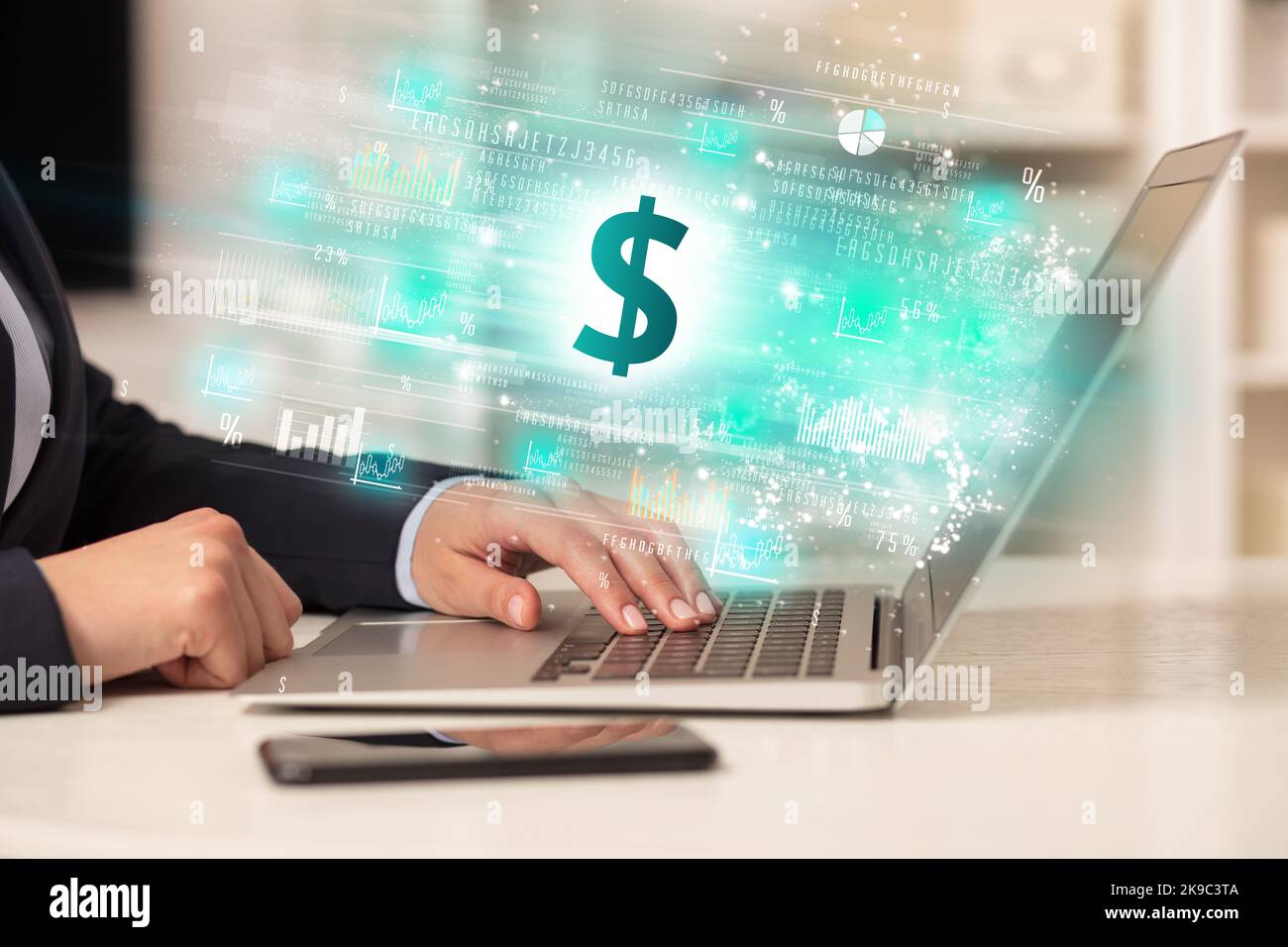 Young man watching stock market on laptop Stock Photo - Alamy