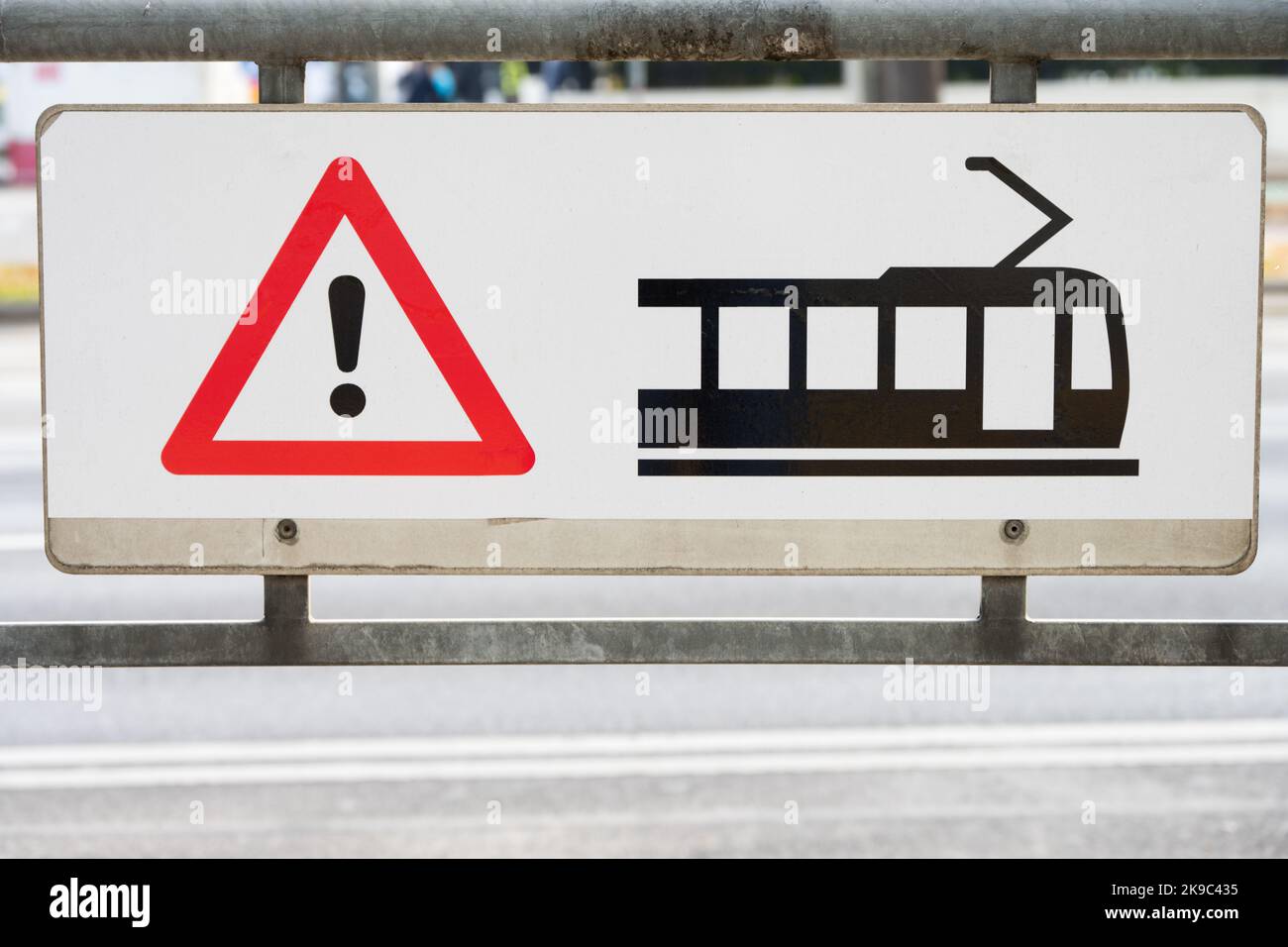 Close-up of on barrier mounted danger traffic hint street road sign ...