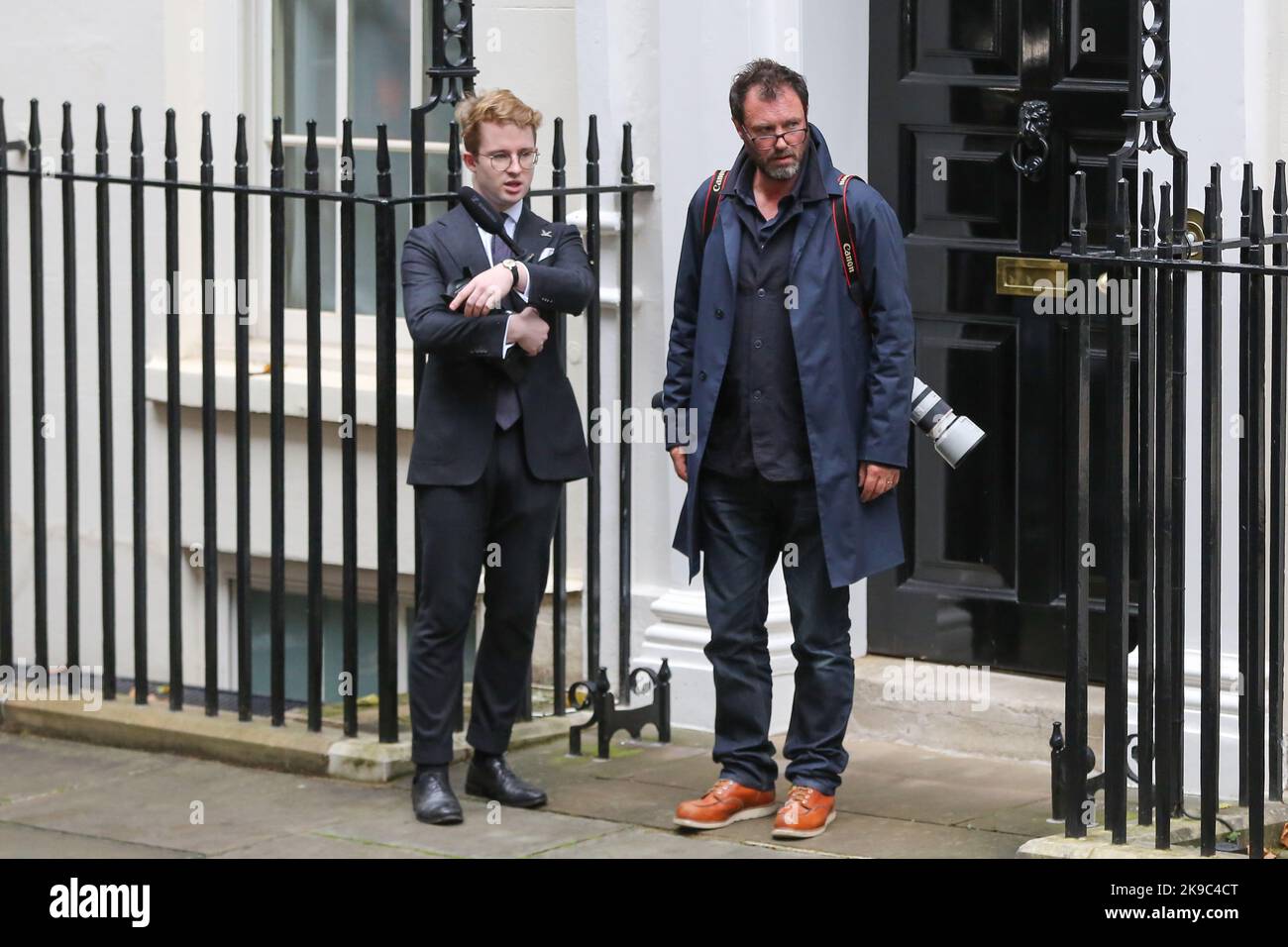 Simon Walker (R) outside No 11 Downing Street waiting for the arrival ...