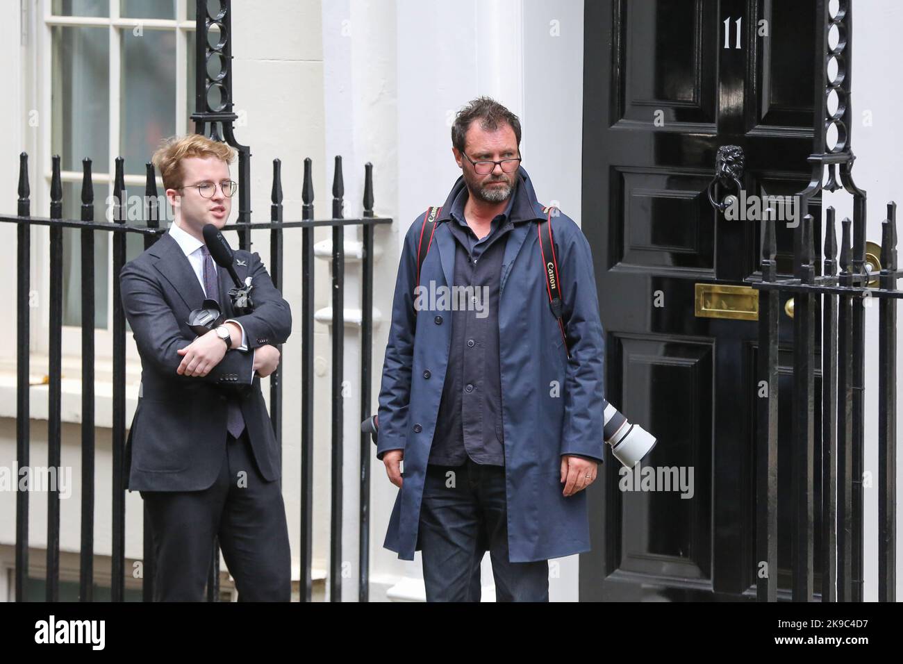 Simon Walker (R) outside No 11 Downing Street waiting for the arrival ...