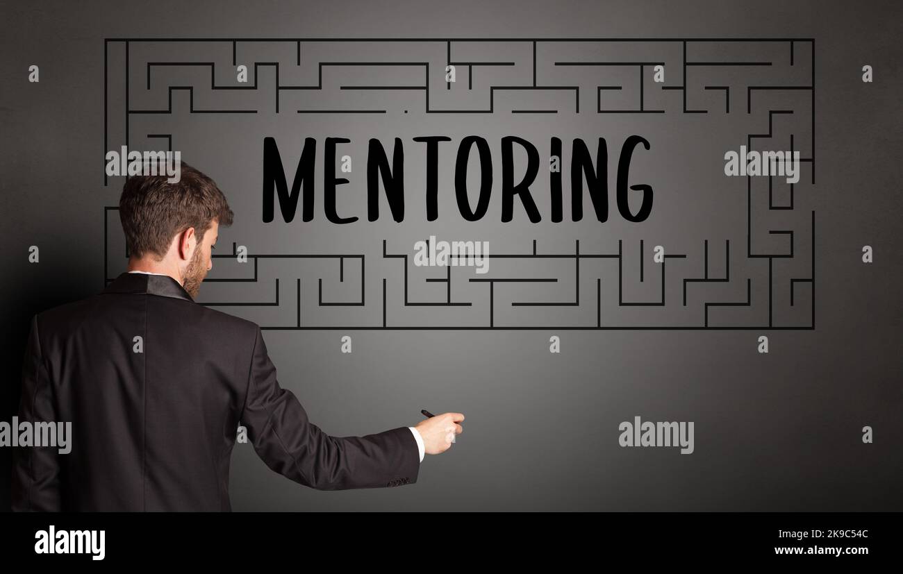 businessman drawing maze concept Stock Photo - Alamy