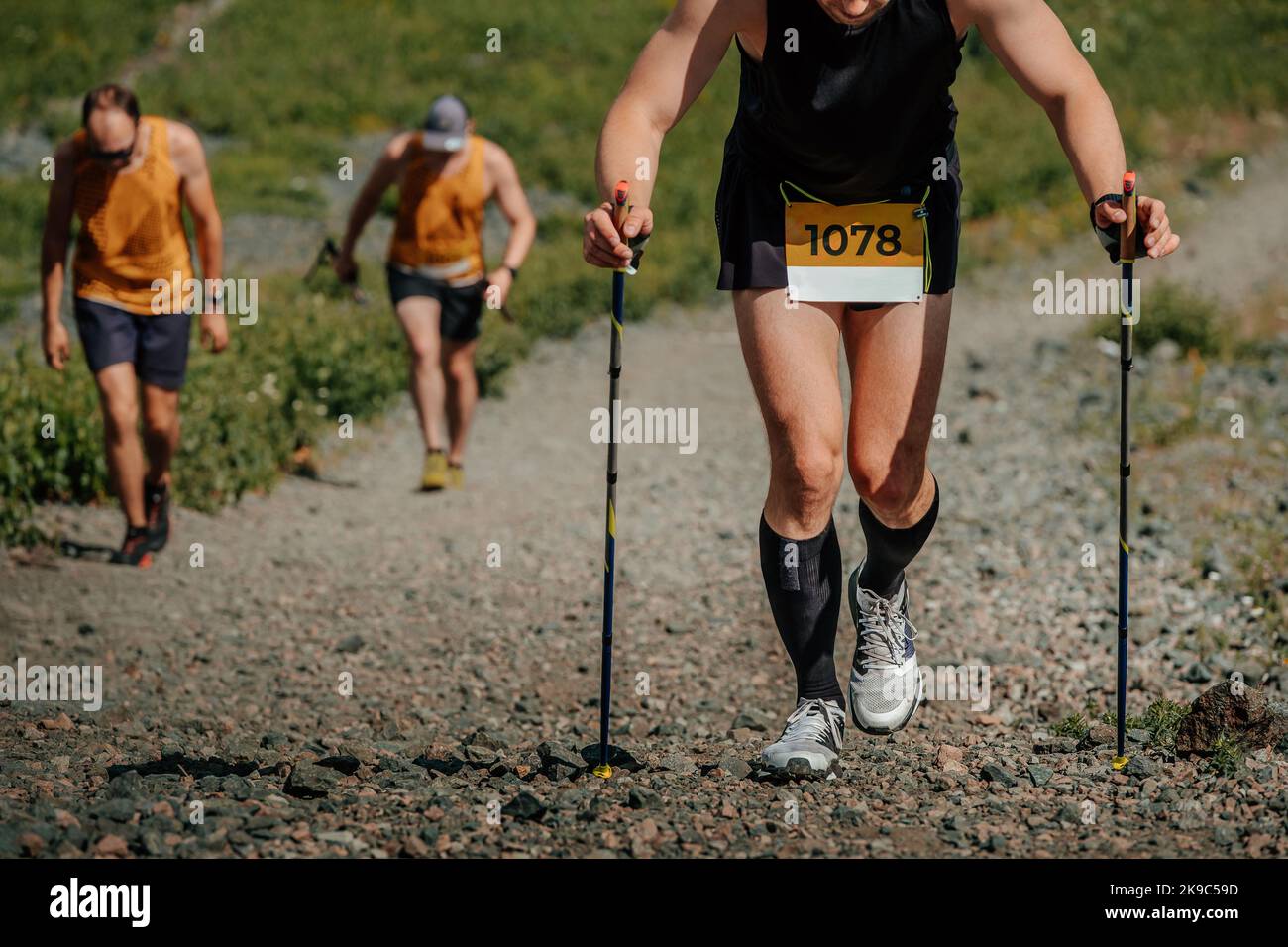 group male athletes running uphill race Stock Photo - Alamy