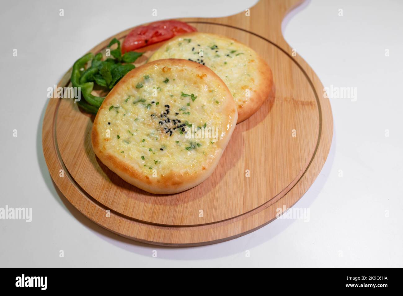 Lebanese Middle Eastern Manakish, Freshly baked Flatbread of cheese ...