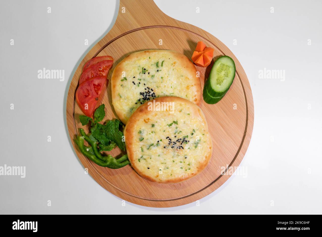 Lebanese Middle Eastern Manakish, Freshly baked Flatbread of cheese ...