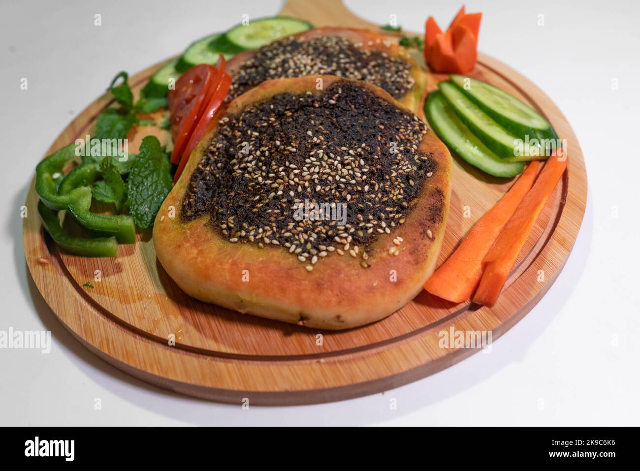 Lebanese Middle Eastern Manakish, Freshly baked Flatbread of cheese ...