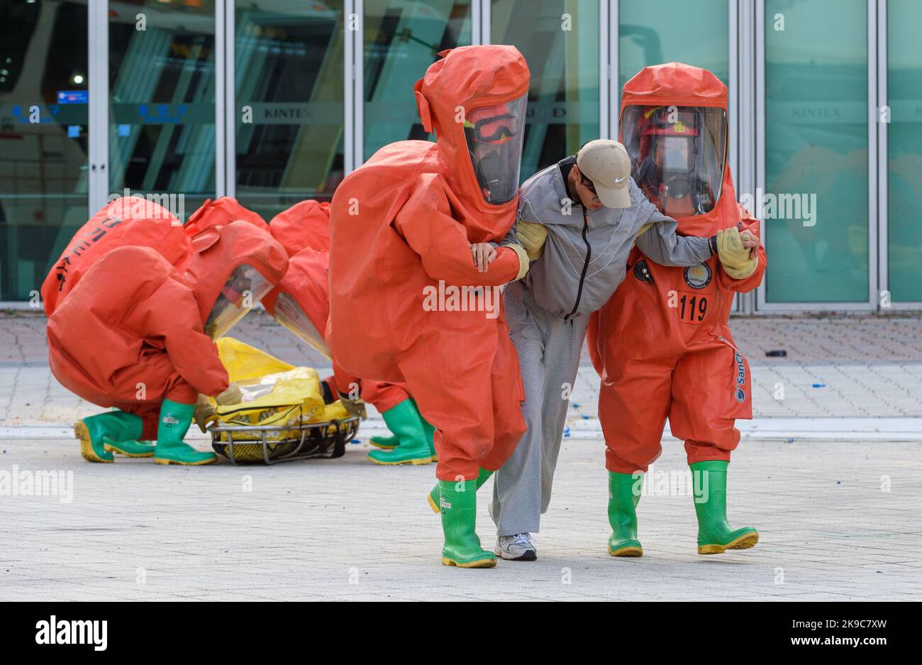 Goyang, South Korea. 27th Oct, 2022. Emergency service members wearing ...
