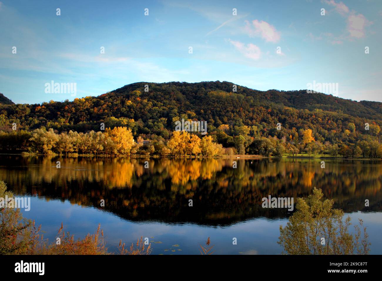 Revine lake in autumn mirror in the water Stock Photo - Alamy