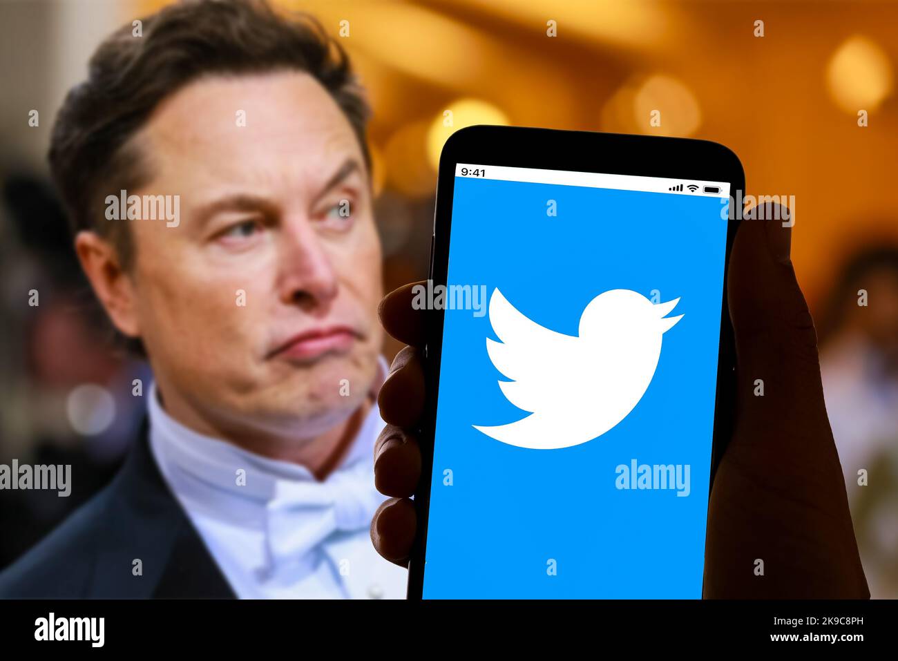 In this photo illustration the social network app Twitter logo is seen on the screen of a mobile ...