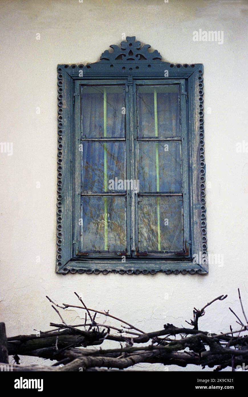 Gorj County, Romania, approx. 2000. Simple wooden window of a ...