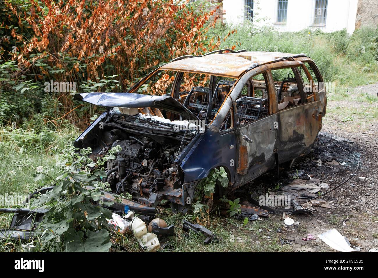 Car after a fire. Burnt rusty car after fire or accident. Car after the ...