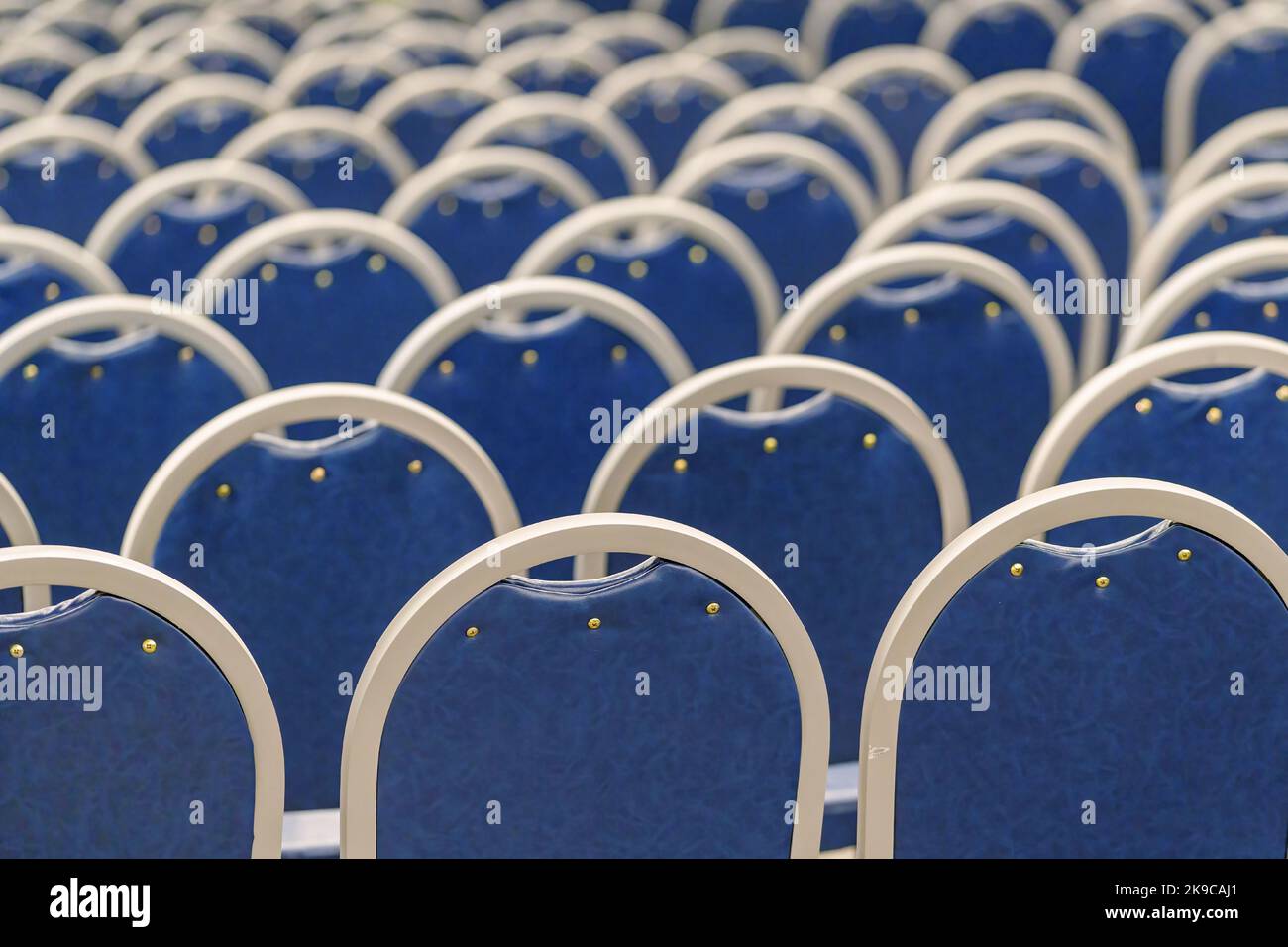 Empty conference hall - rear view of the seats Stock Photo - Alamy