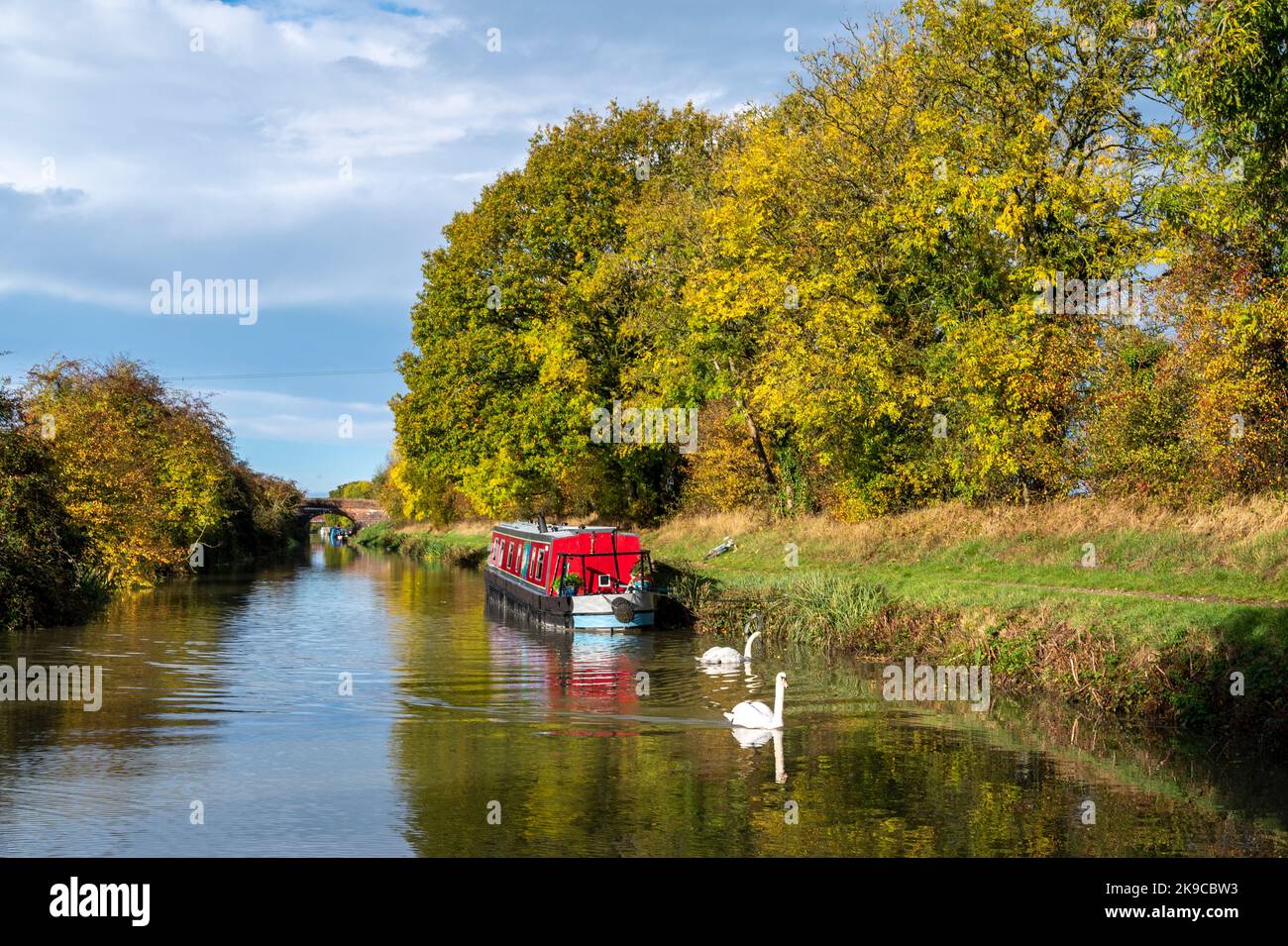 A colourful traditional narrowboat moored on the Kennet and Avon Canal ...