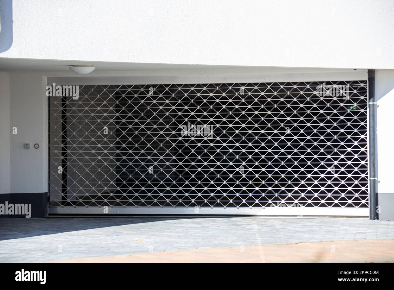 Roller grille gate on a residential complex Stock Photo - Alamy