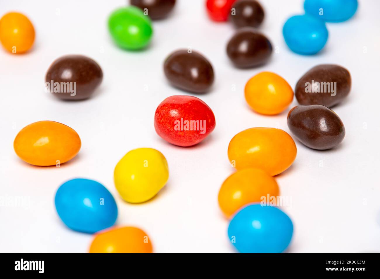 Background of colorful rainbow round candies, flat lay, top view ...