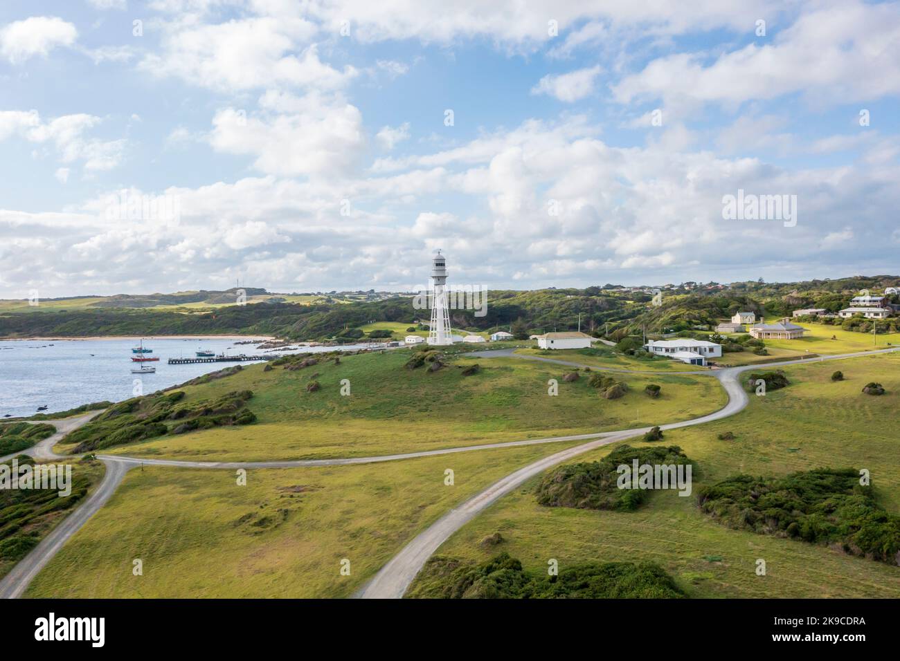 Drone aerial photograph of the Currie Harbour Lighthouse in Currie on King Island in Tasmania in ...