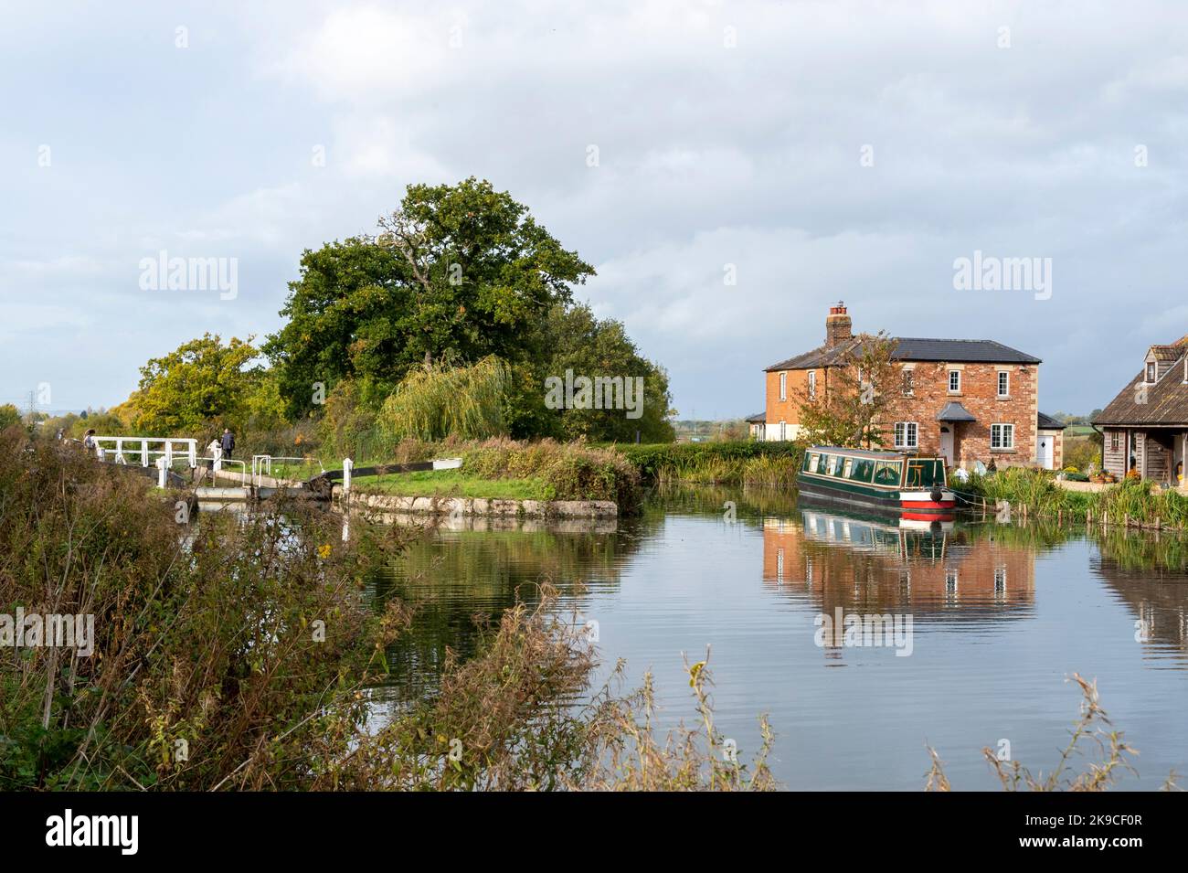 Caen Hill Locks on the Kennet and Avon Canal with lock gates and narrow ...