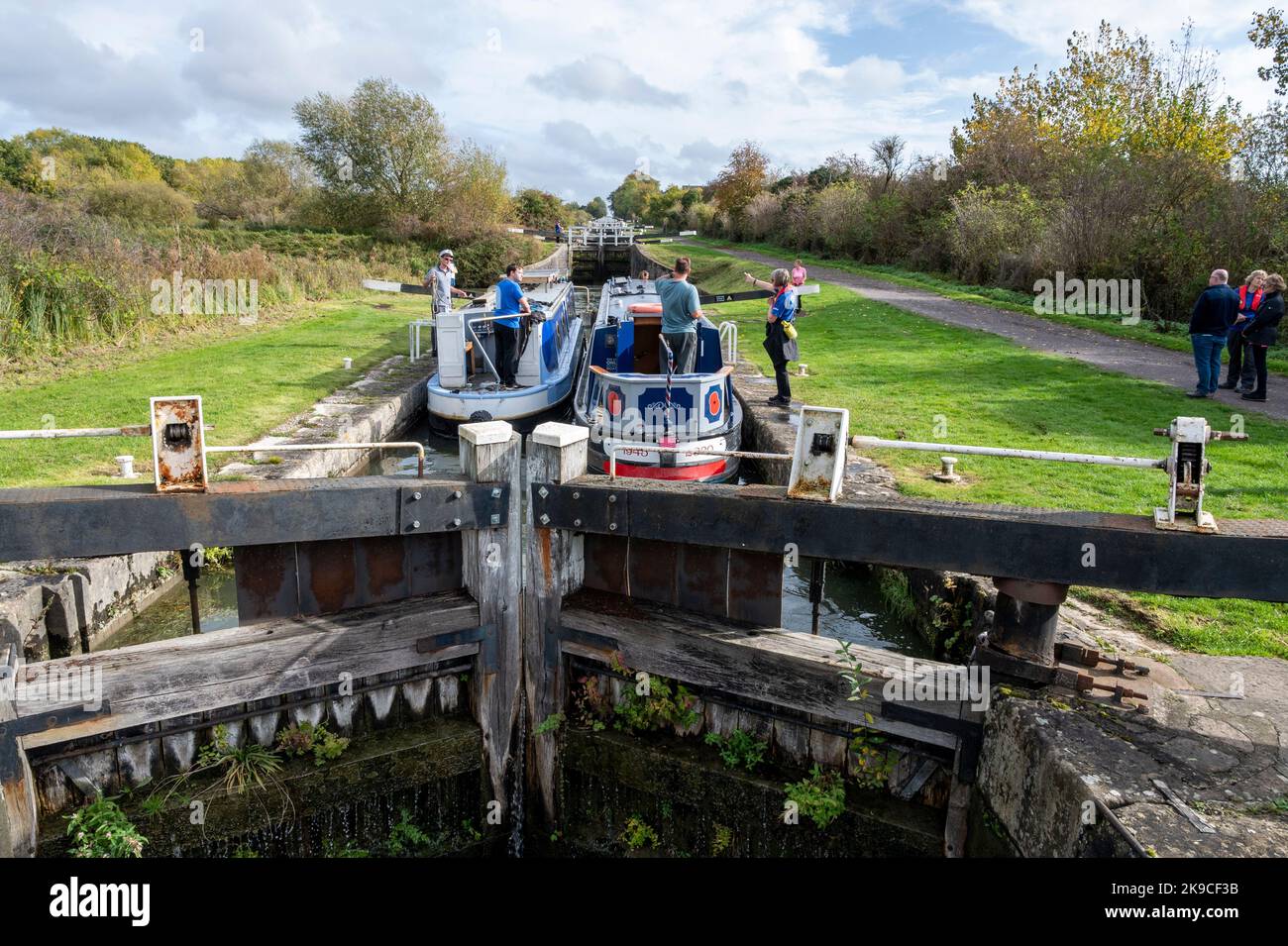 Caen Hill Locks on the Kennet and Avon Canal with lock gates and narrow ...