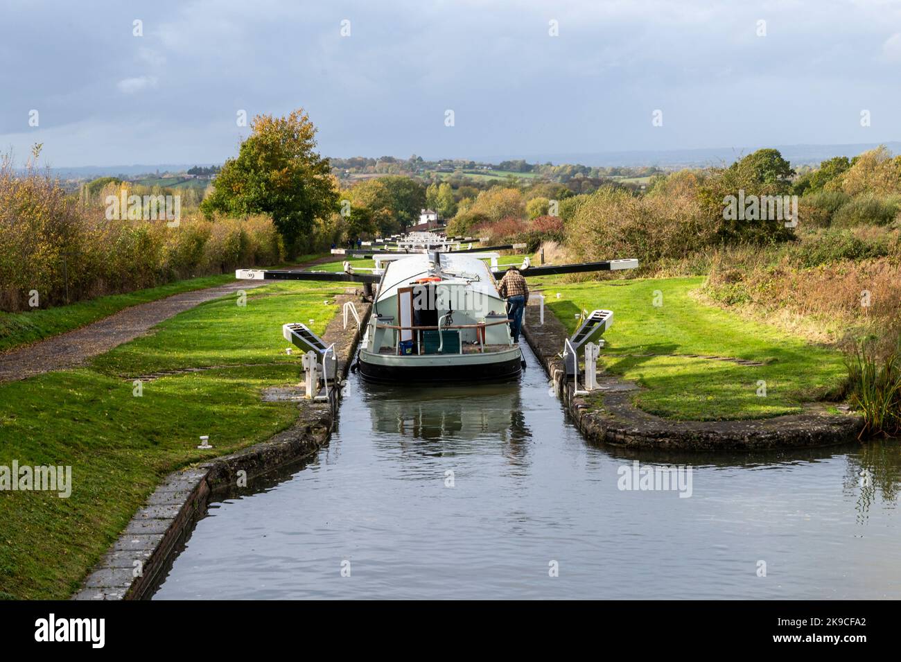 Caen Hill Locks on the Kennet and Avon Canal with lock gates and narrow ...