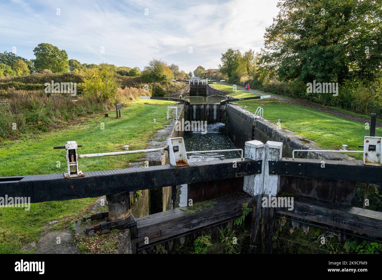 Caen Hill Locks on the Kennet and Avon Canal with lock gates and narrow ...