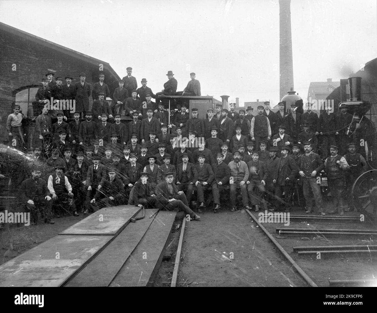 Staff at the locomotive station Stock Photo - Alamy