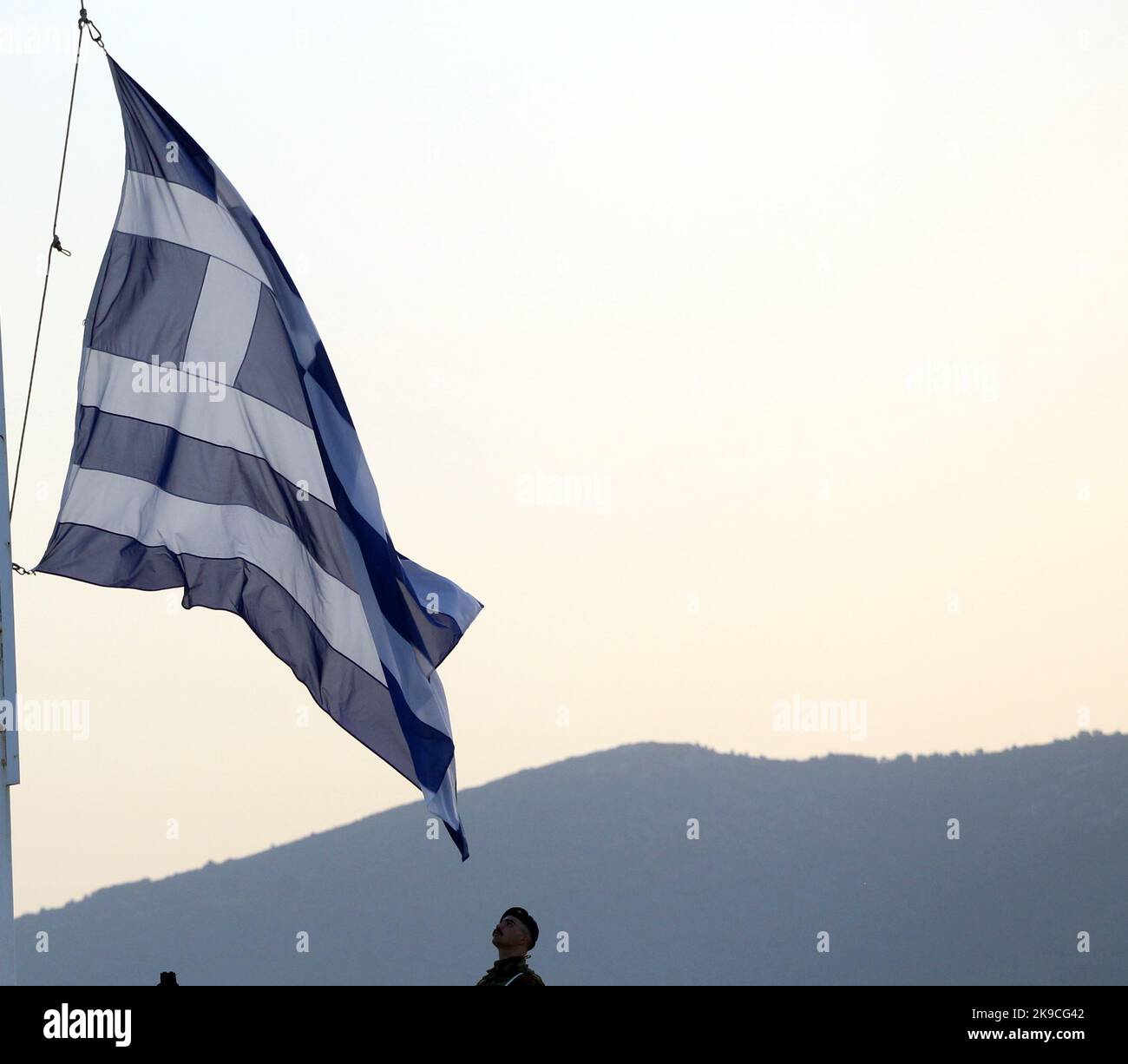 flag raising on the hill of Acropolis Stock Photo - Alamy