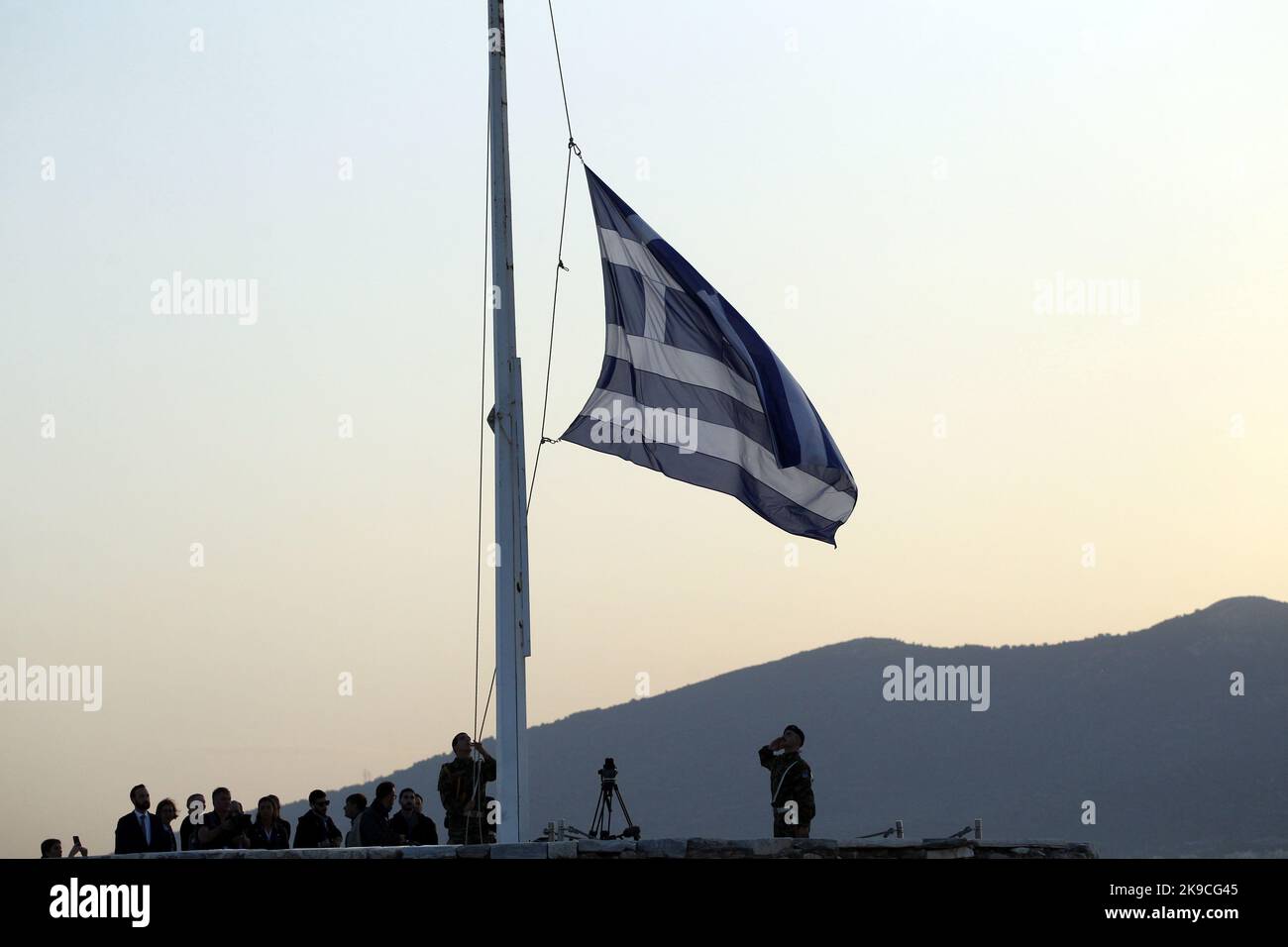 flag raising on the hill of Acropolis Stock Photo - Alamy