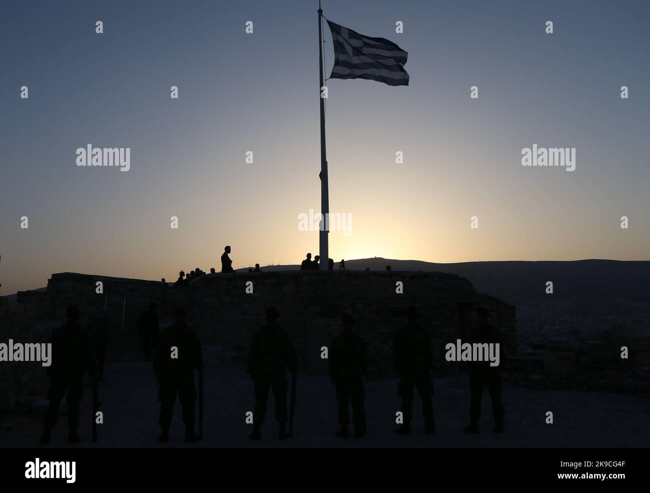 flag raising on the hill of Acropolis Stock Photo - Alamy