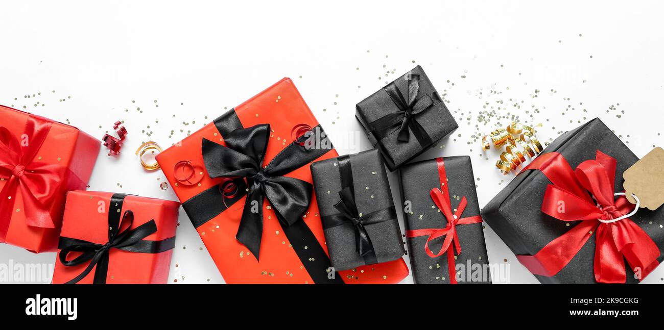 Many gift boxes on white background, top view Stock Photo - Alamy