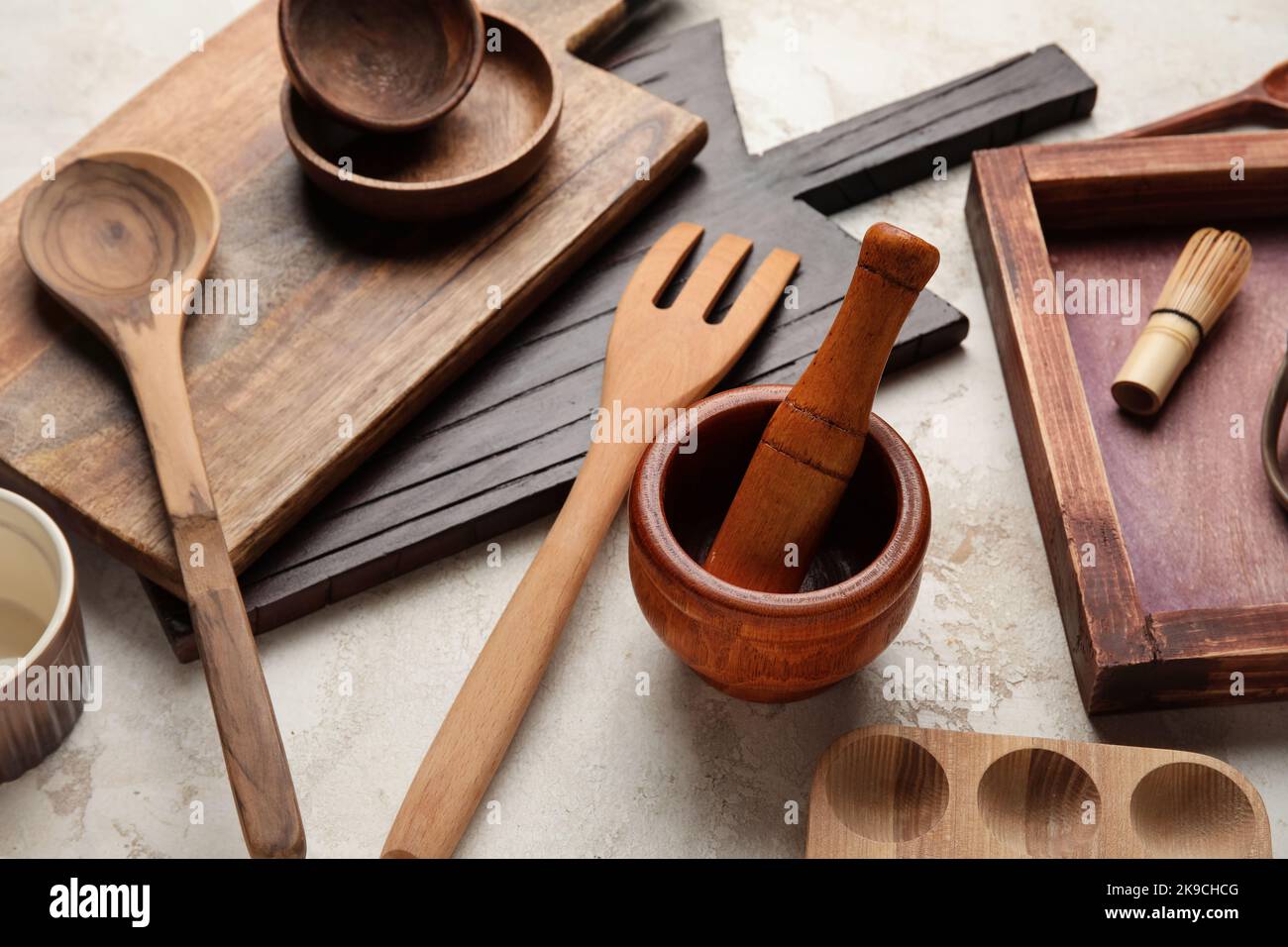 Wooden cooking utensils on grunge background Stock Photo - Alamy