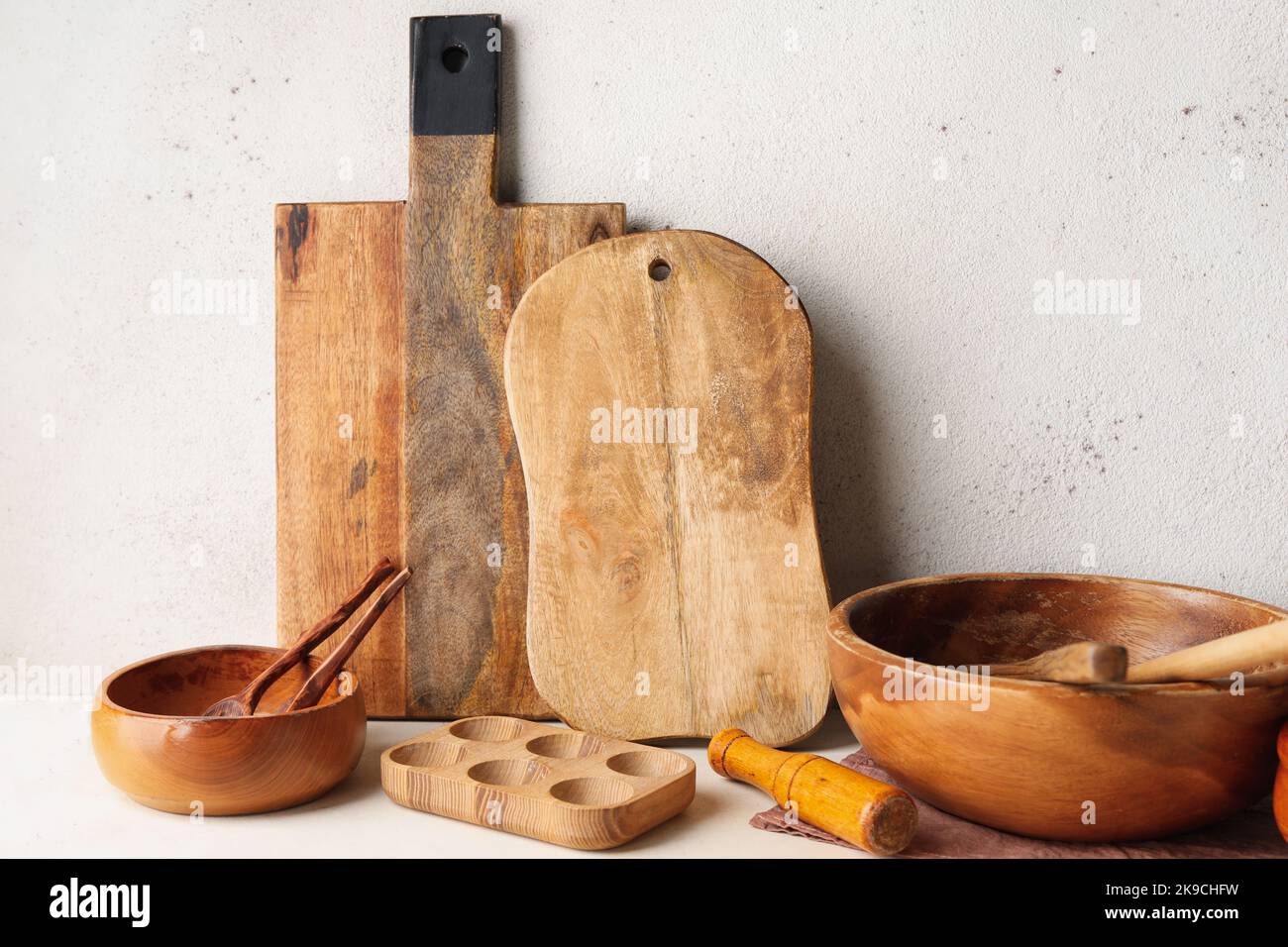 Wooden cooking utensils on white background Stock Photo - Alamy