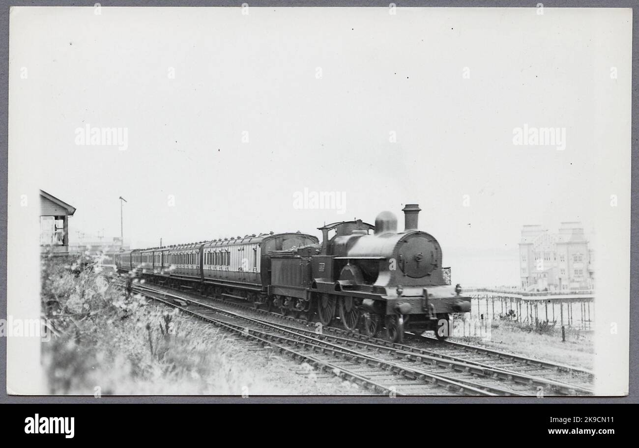 Steam locomotive with passenger car Stock Photo - Alamy
