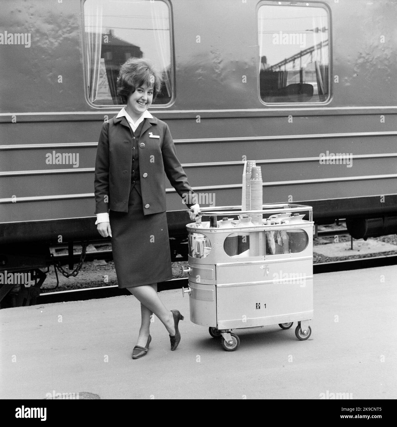 Traffic restaurants, tr. Train hostess and service boy Stock Photo - Alamy