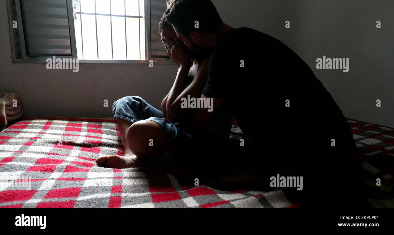 Boyfriend consoling depressed crying girlfriend in bed at home Stock ...