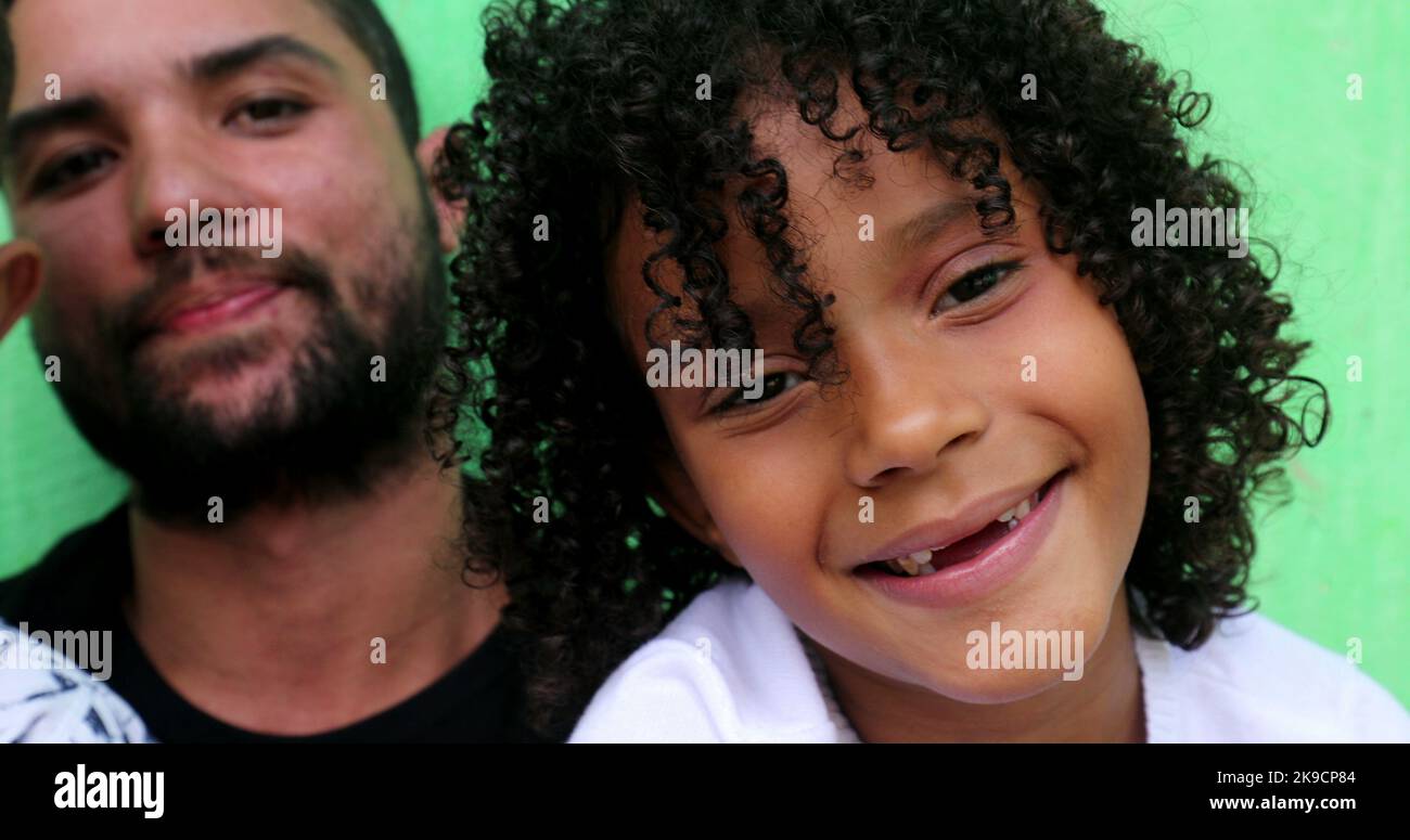Brazilian father and children smiling. South american dad and kids2 ...