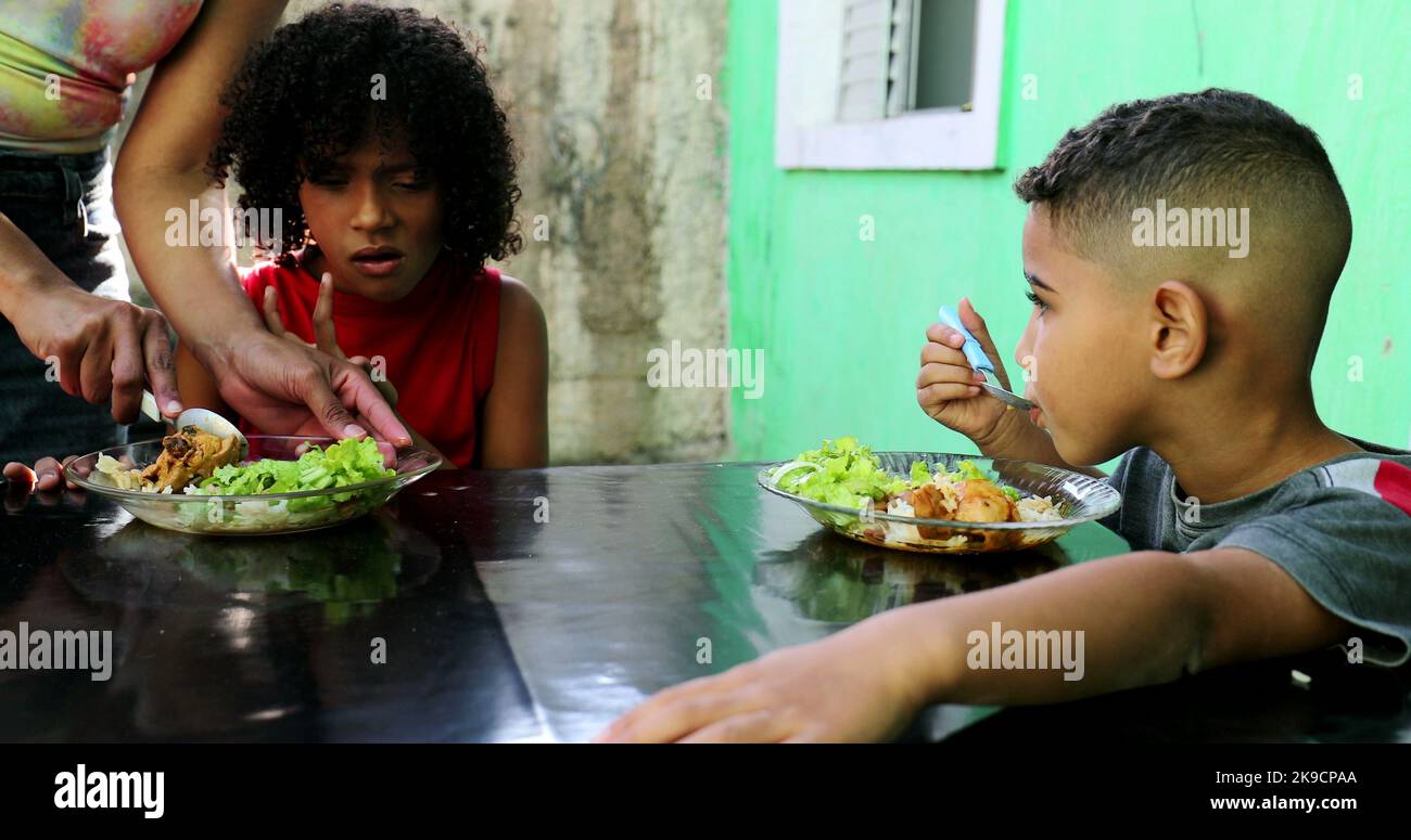 Brazilian kids eating lunch. Hispanic children lunch time Stock Photo ...