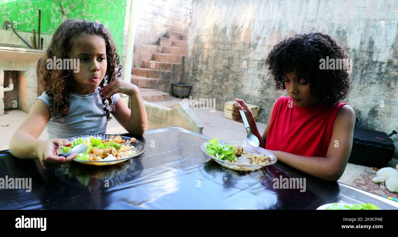 Brazilian kids eating lunch. Hispanic children lunch time4 Stock Photo ...