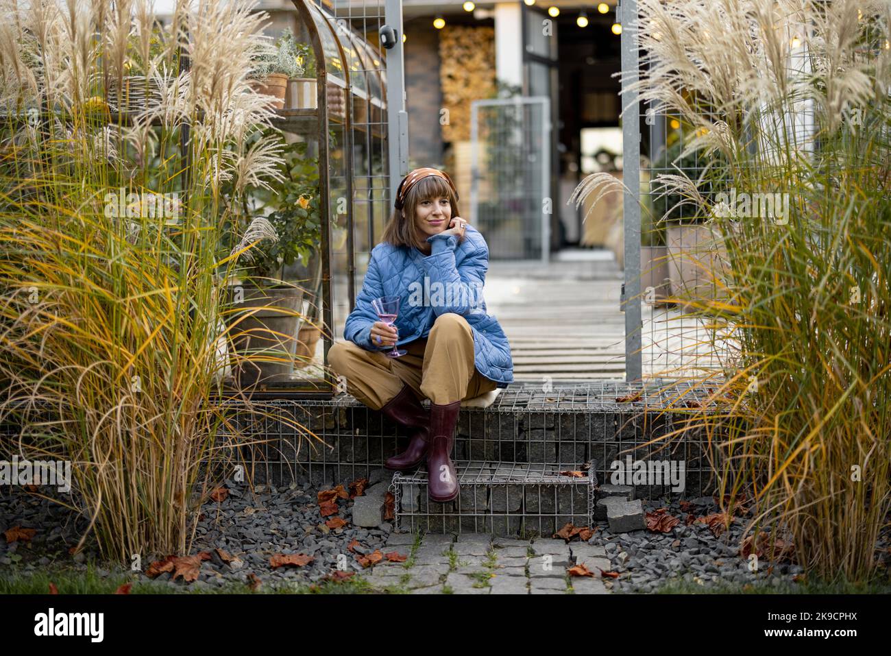 Two people outside a house two people outside a house hi-res stock ...