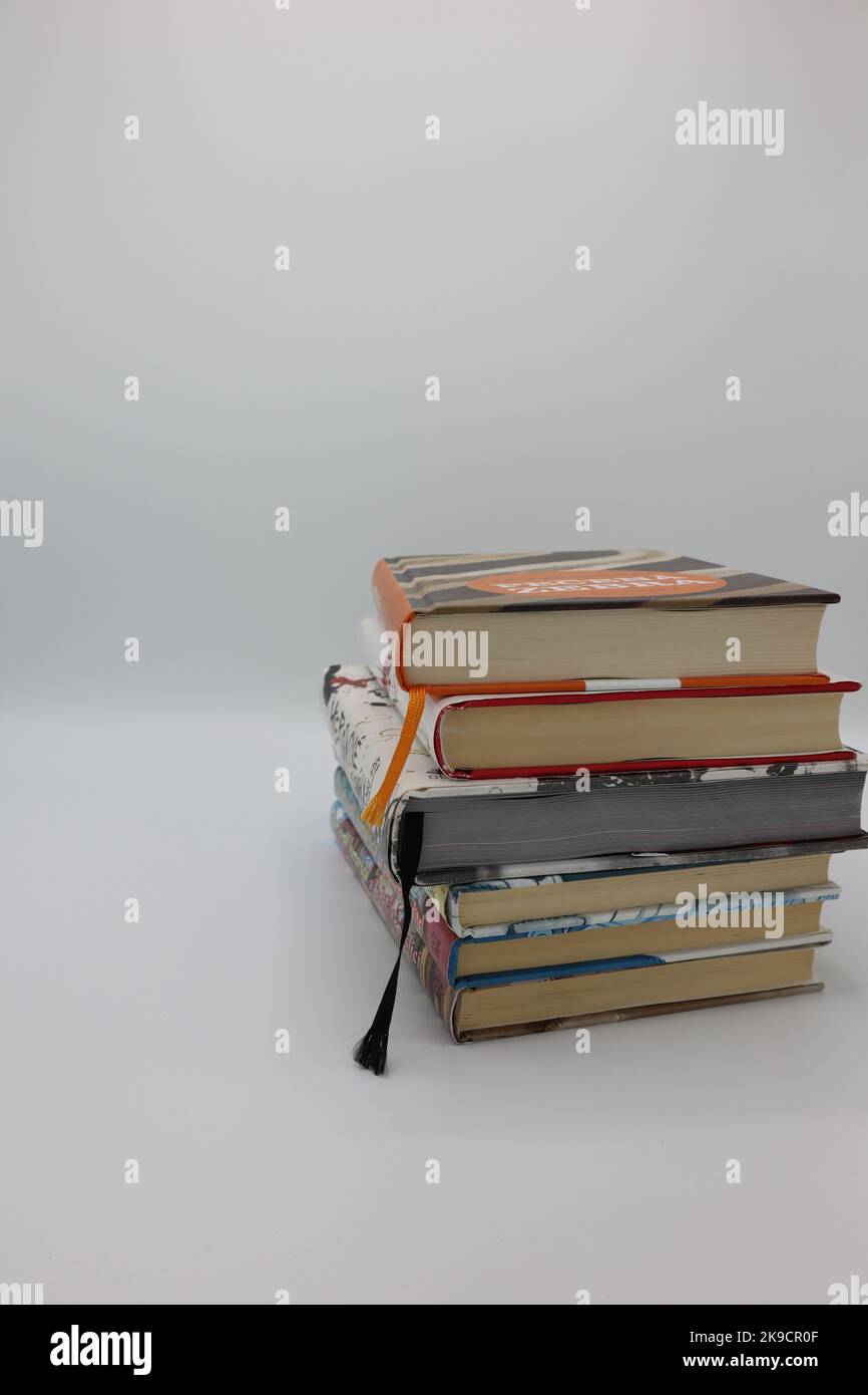 Pile of books on a white background with copy space Stock Photo - Alamy