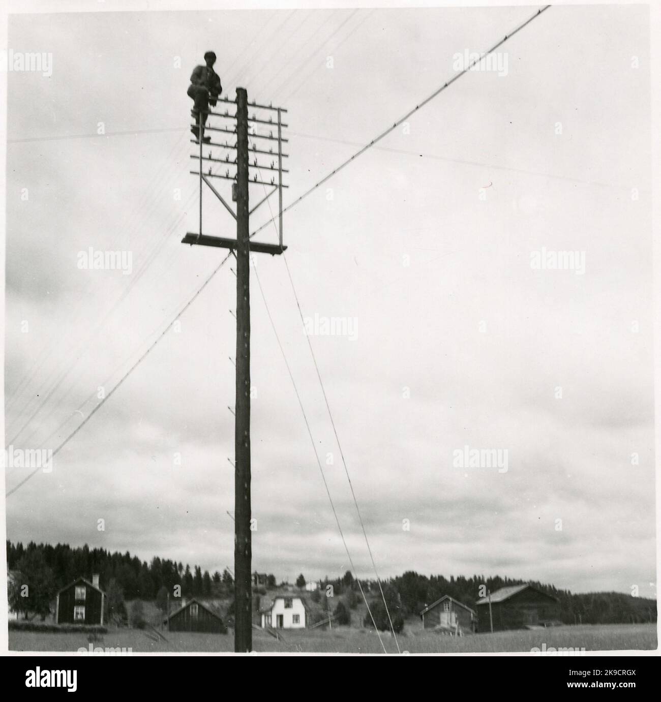 Repair of telegrapher after thunderstorm Stock Photo - Alamy