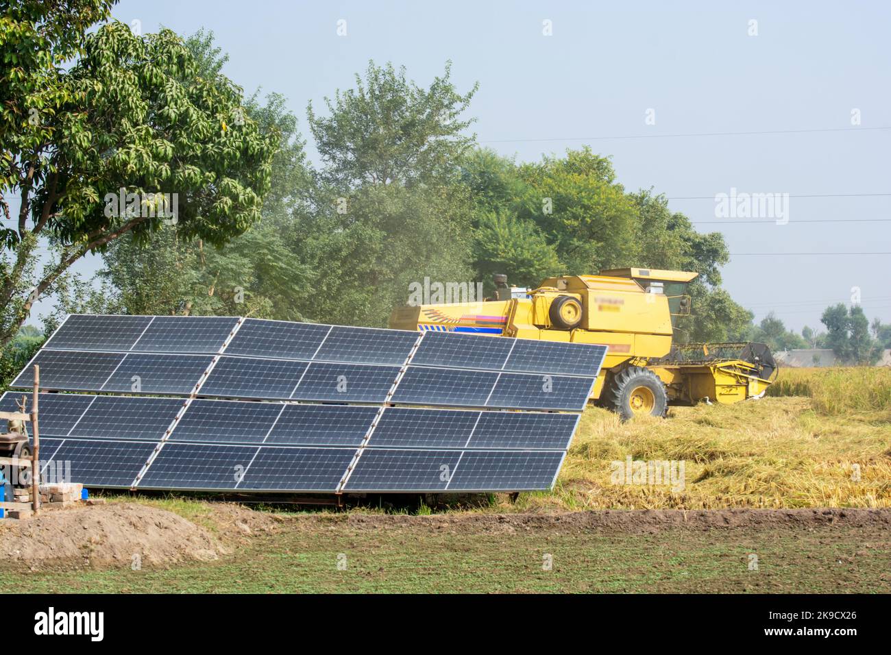 Solar powered irrigation turbine and combine harvester in the rice ...