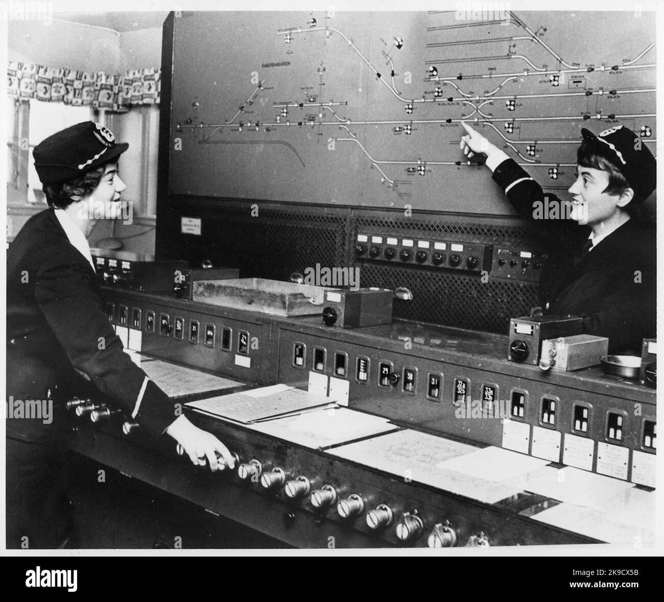 Ulla-Britt Ekblom (right) together with unknown woman at switchgear in ...