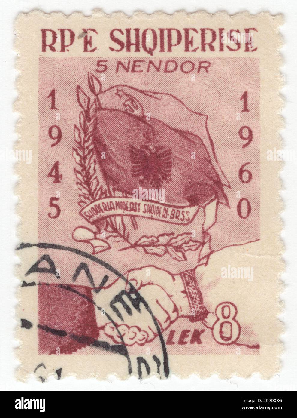 ALBANIA - 1961: An 8 Lek dull red brown postage stamp showing flags of ...