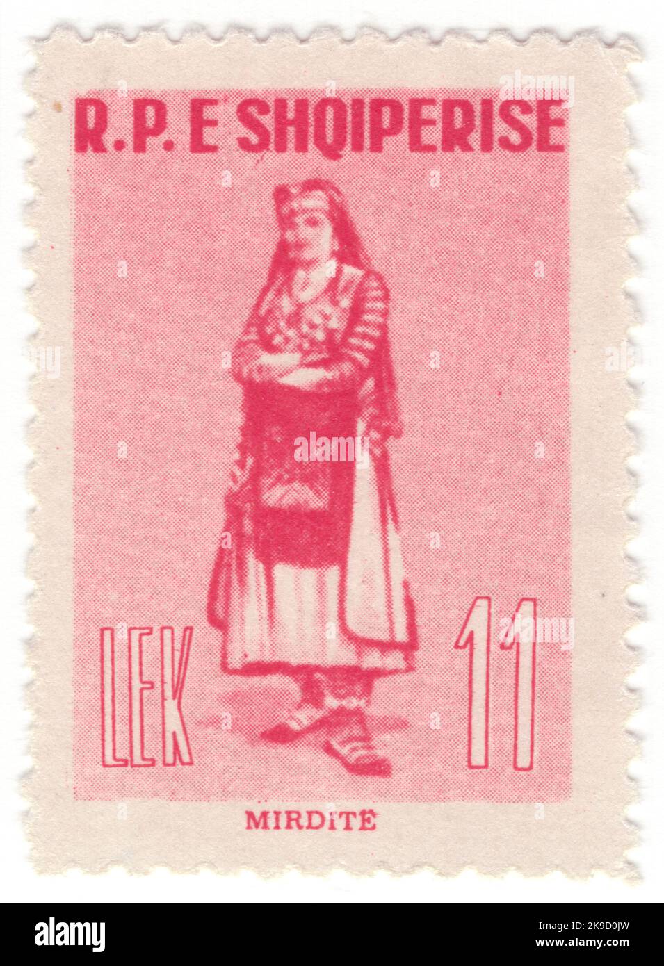 ALBANIA - 1961 April 28: An 11 lek red postage stamp showing Albanian ...