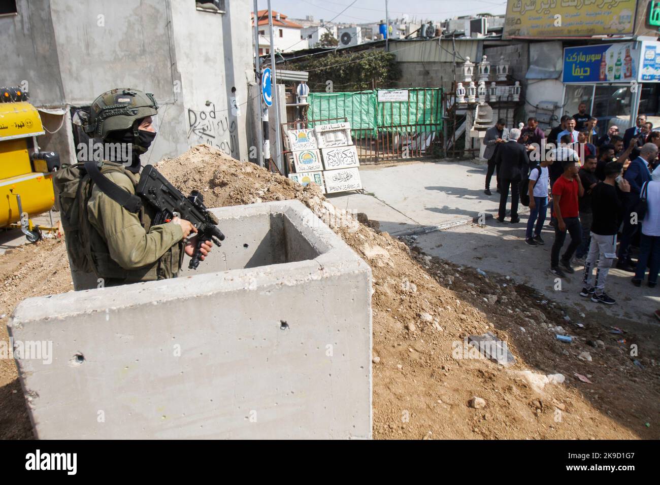 Nablus, Palestine. 26th Oct, 2022. An Israeli soldier seen guarding a ...